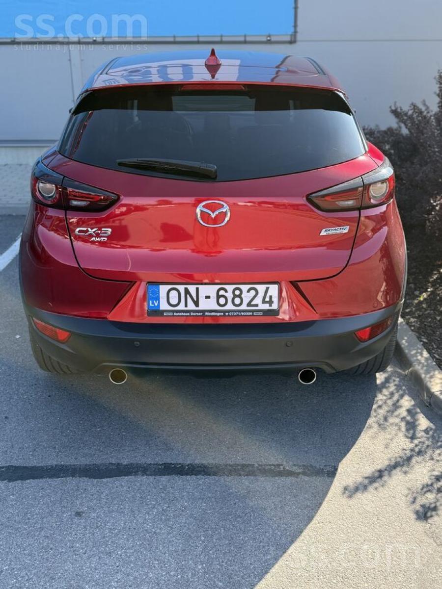 Red Mazda CX-3 2019 in Liepaja, with an engine capacity of 2.00 L and mileage of 107 thousand km for 13800 €, photo 6 on AUTOMOTO.COM.LV