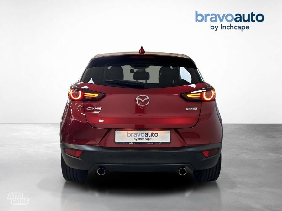 Red Mazda CX-3 2021 in Vilnius, with an engine capacity of 2.00 L and mileage of 105 thousand km for 18900 €, photo 4 on AUTOMOTO.COM.LV