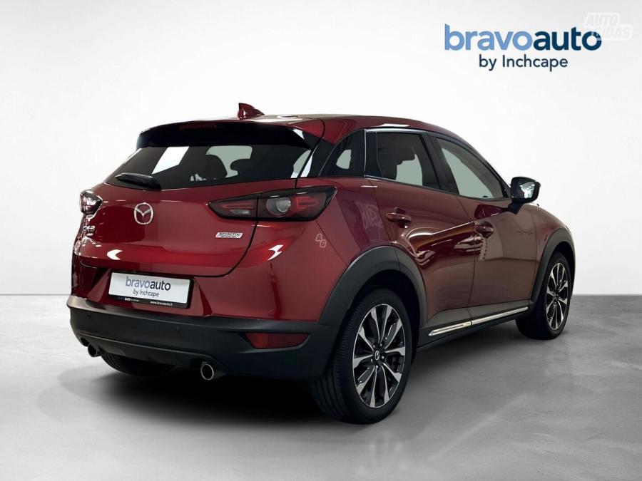 Red Mazda CX-3 2021 in Vilnius, with an engine capacity of 2.00 L and mileage of 105 thousand km for 18900 €, photo 5 on AUTOMOTO.COM.LV
