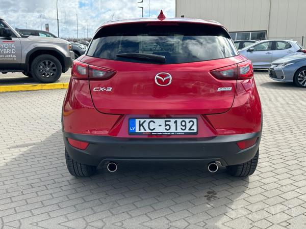 Sarkans Mazda CX-3 2015 Liepāja, ar dzinēja tilpumu 2.00 L un nobraukumu 135 tūkst. km par 10700 €, foto 8 vietnē AUTOMOTO.COM.LV