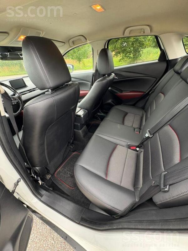 White Mazda CX-3 2015 in Ventspils, with an engine capacity of 1.50 L and mileage of 198 thousand km for 9500 €, photo 4 on AUTOMOTO.COM.LV