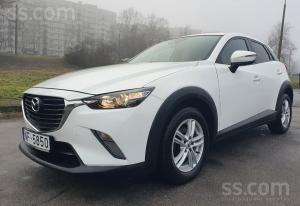 Balts Mazda CX-3 2015 Rīga, ar dzinēja tilpumu 1.50 L un nobraukumu 143 tūkst. km par 9300 €, foto  vietnē AUTOMOTO.COM.LV