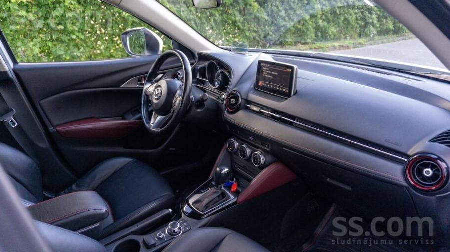 White Mazda CX-3 2015 in Riga, with an engine capacity of 1.50 L and mileage of 201 thousand km for 9590 €, photo 11 on AUTOMOTO.COM.LV