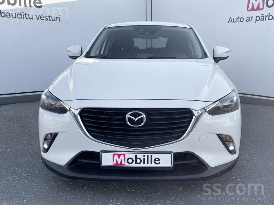 White Mazda CX-3 2016 in Riga, with an engine capacity of 1.50 L and mileage of 247 thousand km for 8350 €, photo 2 on AUTOMOTO.COM.LV
