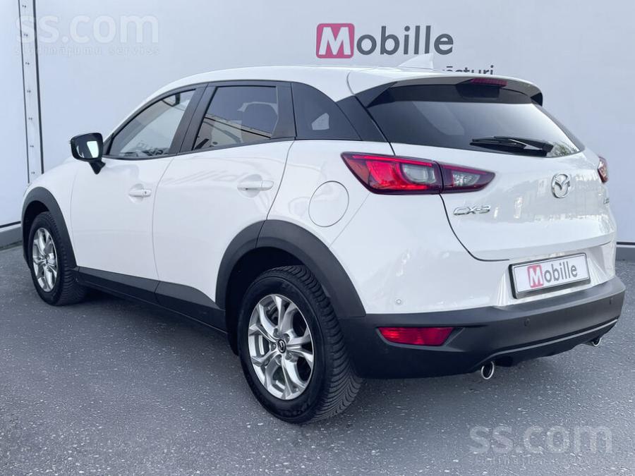 White Mazda CX-3 2016 in Riga, with an engine capacity of 1.50 L and mileage of 247 thousand km for 8350 €, photo 4 on AUTOMOTO.COM.LV
