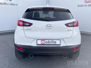 White Mazda CX-3 2016 in Riga, with an engine capacity of 1.50 L and mileage of 247 thousand km for 8350 €, photo 5 on AUTOMOTO.COM.LV