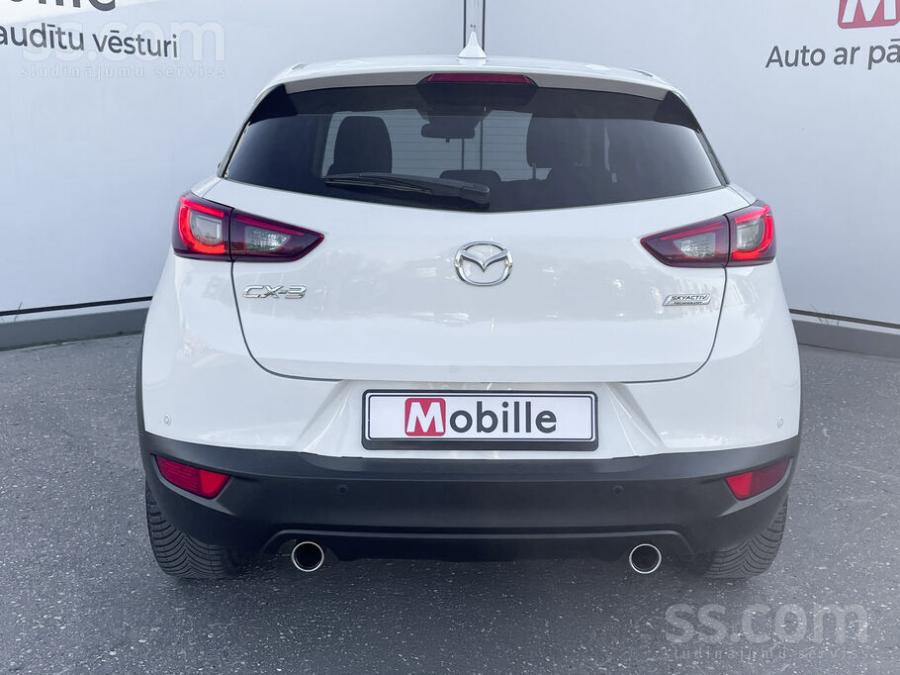 White Mazda CX-3 2016 in Riga, with an engine capacity of 1.50 L and mileage of 247 thousand km for 8350 €, photo 5 on AUTOMOTO.COM.LV
