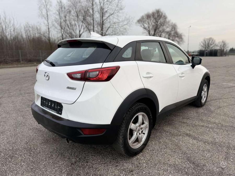 White Mazda CX-3 2017 in Marijampole, with an engine capacity of 2.00 L and mileage of 163 thousand km for 7650 €, photo 3 on AUTOMOTO.COM.LV
