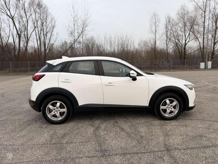 White Mazda CX-3 2017 in Marijampole, with an engine capacity of 2.00 L and mileage of 163 thousand km for 7650 €, photo 5 on AUTOMOTO.COM.LV