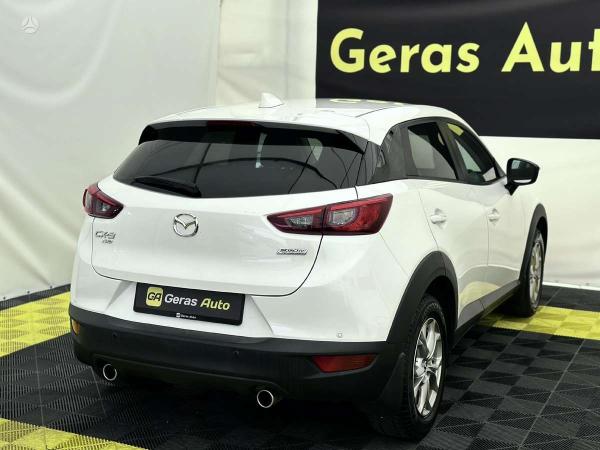 White Mazda CX-3 2017 in Vilnius, with an engine capacity of 2.00 L and mileage of 173 thousand km for 10750 €, photo 4 on AUTOMOTO.COM.LV