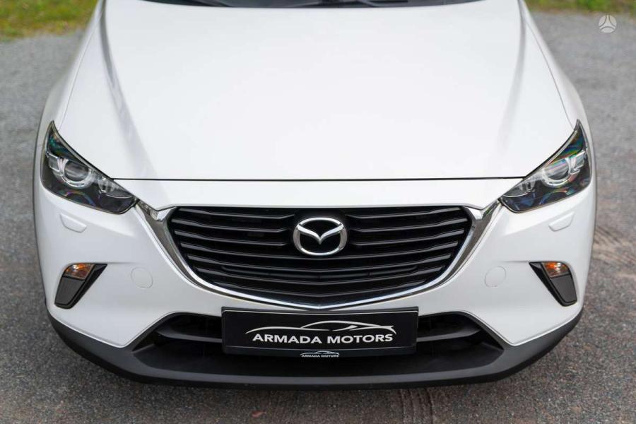 White Mazda CX-3 2017 in Vilnius, with an engine capacity of 2.00 L and mileage of 116 thousand km for 12900 €, photo 6 on AUTOMOTO.COM.LV