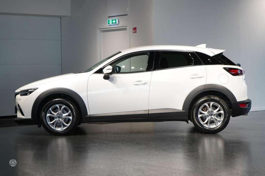White Mazda CX-3 2018 in Vilnius, with an engine capacity of 2.00 L and mileage of 90 thousand km for 14900 €, photo 3 on AUTOMOTO.COM.LV