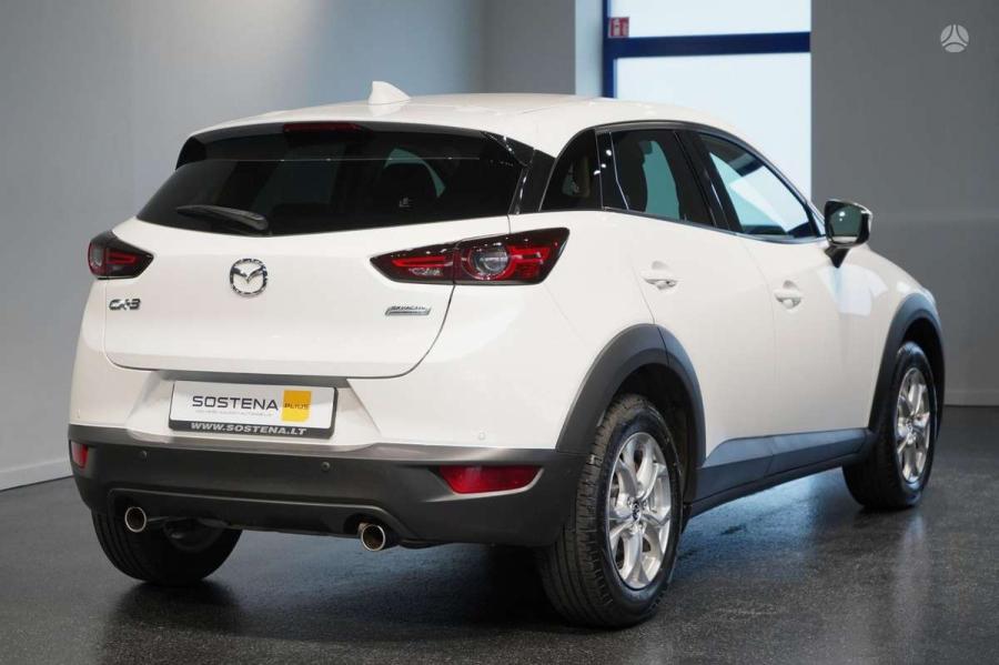 White Mazda CX-3 2018 in Vilnius, with an engine capacity of 2.00 L and mileage of 90 thousand km for 14900 €, photo 4 on AUTOMOTO.COM.LV