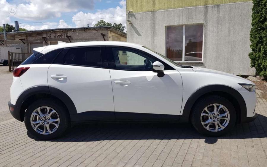 White Mazda CX-3 2018 in Siauliai, with an engine capacity of 1.76 L and mileage of 190 thousand km for 8200 €, photo 6 on AUTOMOTO.COM.LV