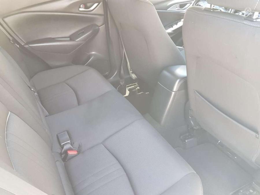 White Mazda CX-3 2018 in Siauliai, with an engine capacity of 1.76 L and mileage of 190 thousand km for 8200 €, photo 12 on AUTOMOTO.COM.LV