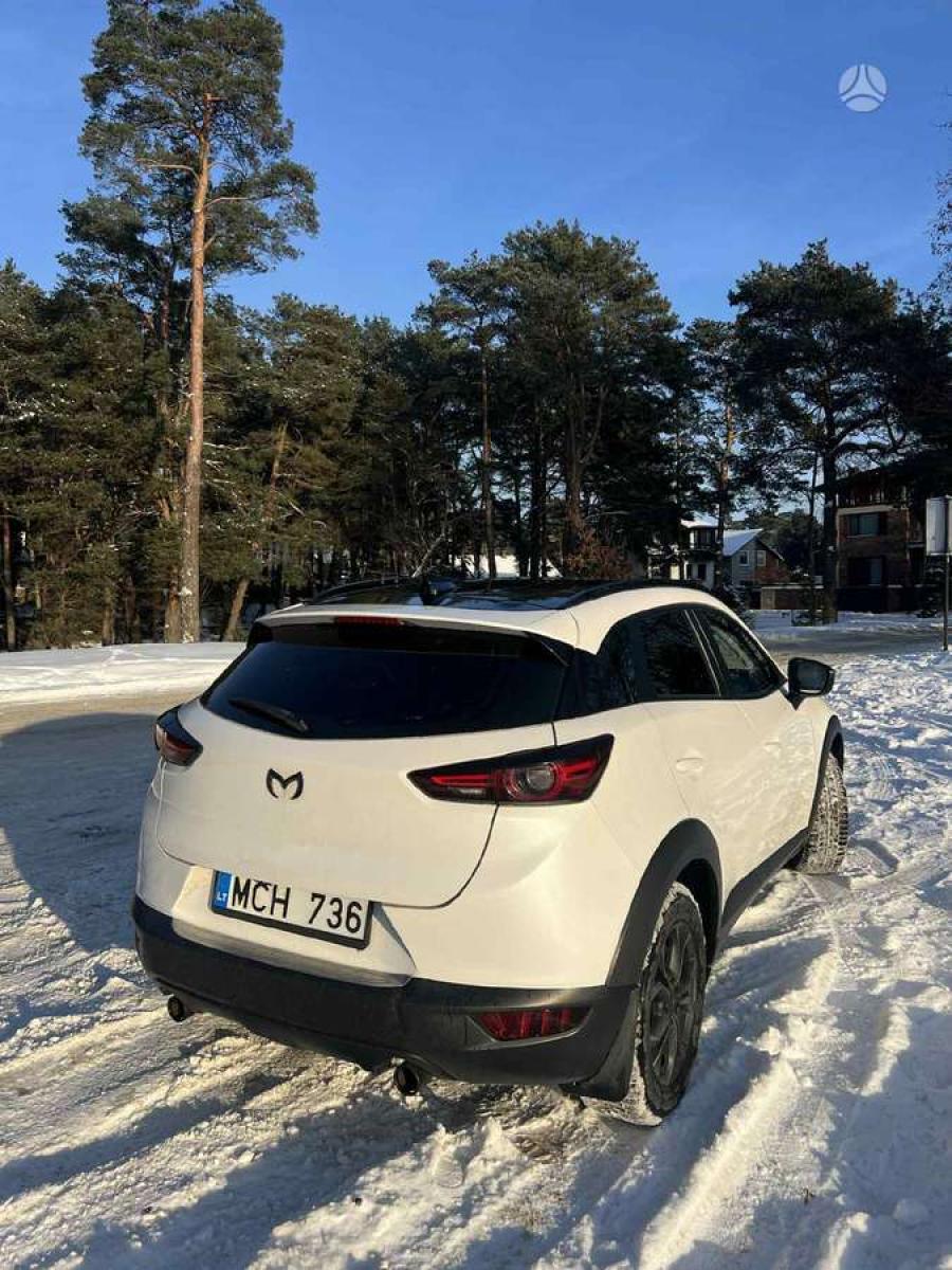 White Mazda CX-3 2020 in Kaunas, with an engine capacity of 2.00 L and mileage of 85 thousand km for 16500 €, photo 3 on AUTOMOTO.COM.LV