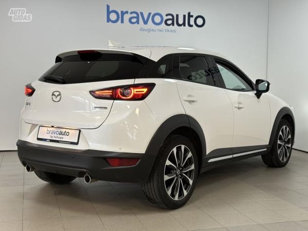 White Mazda CX-3 2021 in Vilnius, with an engine capacity of 2.00 L and mileage of 64 thousand km for 20500 €, photo 6 on AUTOMOTO.COM.LV