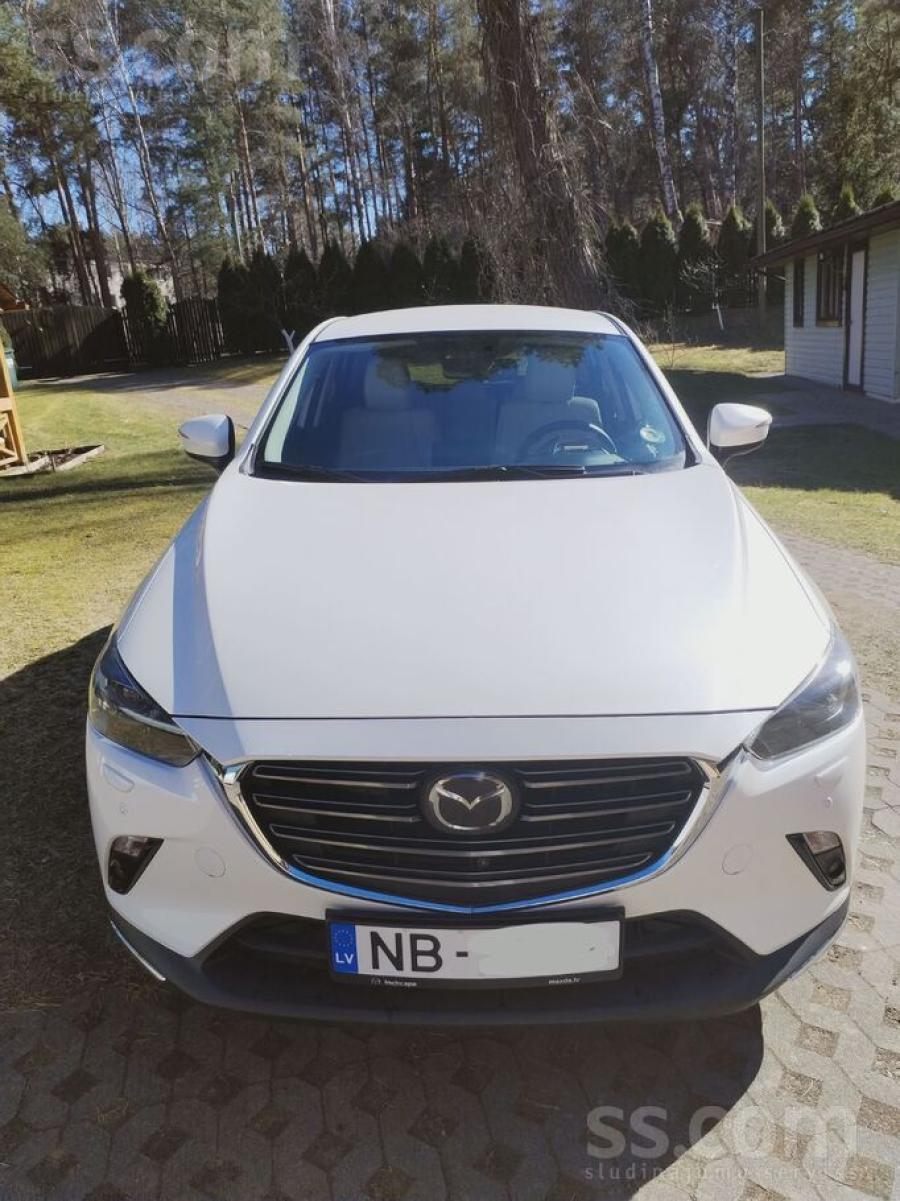 White Mazda CX-3 2021 in Riga, with an engine capacity of 2.00 L and mileage of 64 thousand km for 15000 €, photo 1 on AUTOMOTO.COM.LV