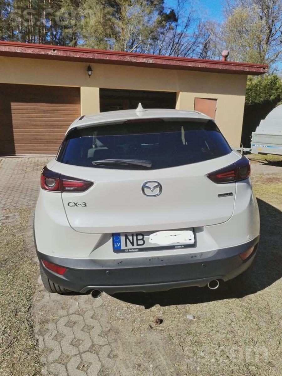 White Mazda CX-3 2021 in Riga, with an engine capacity of 2.00 L and mileage of 64 thousand km for 15000 €, photo 3 on AUTOMOTO.COM.LV