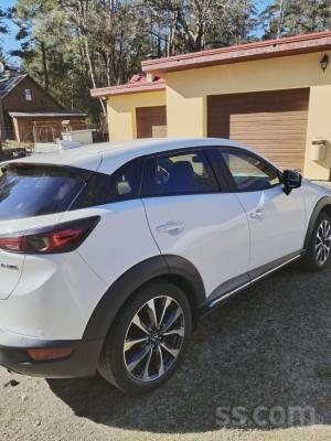 White Mazda CX-3 2021 in Riga, with an engine capacity of 2.00 L and mileage of 64 thousand km for 15000 €, photo 4 on AUTOMOTO.COM.LV