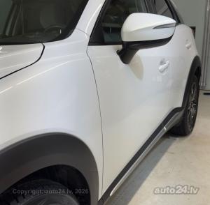 White Mazda CX-3 2015 in Tallinn, with an engine capacity of 2.00 L and mileage of 85 thousand km for 13000 €, photo 3 on AUTOMOTO.COM.LV