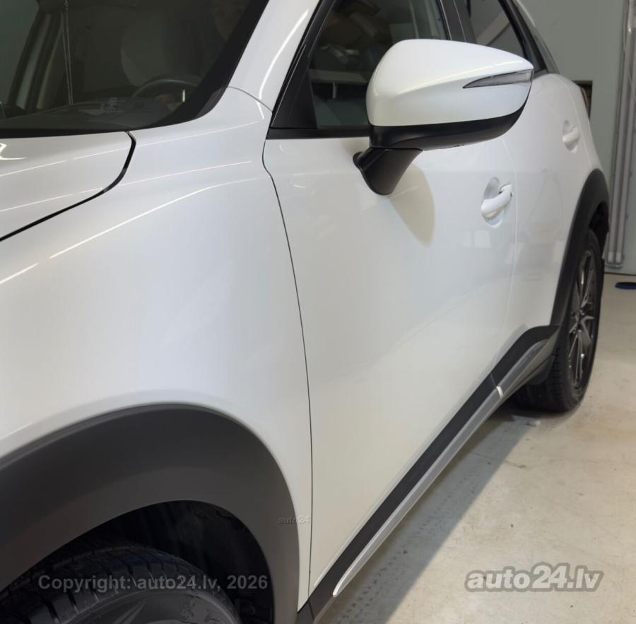 White Mazda CX-3 2015 in Tallinn, with an engine capacity of 2.00 L and mileage of 85 thousand km for 13000 €, photo 3 on AUTOMOTO.COM.LV