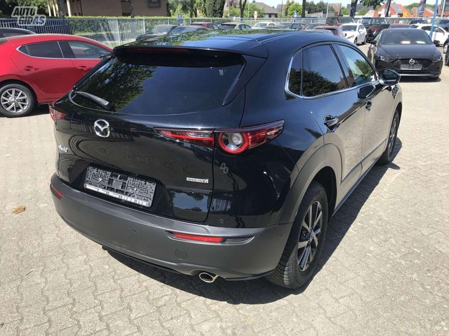 Черный Мазда CX-30 2021 в Каунас, объемом двигателя 2.00 л и пробегом 32 тыс. км за 27760 €, фото 7 на AUTOMOTO.COM.LV