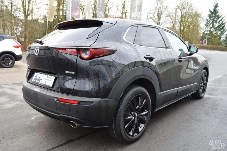 Melns Mazda CX-30 2022 Kauņa, ar dzinēja tilpumu 2.00 L un nobraukumu 59 tūkst. km par 22390 €, foto 9 vietnē AUTOMOTO.COM.LV