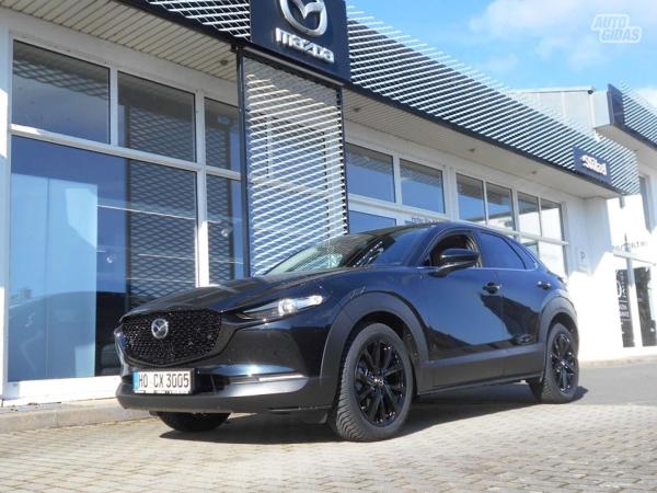 Melns Mazda CX-30 2024 Kauņa, ar dzinēja tilpumu 2.00 L un nobraukumu 12 tūkst. km par 32790 €, foto 1 vietnē AUTOMOTO.COM.LV