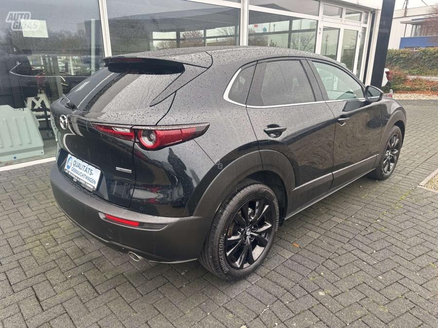 Black Mazda CX-30 2025 in Kaunas, with an engine capacity of 2.50 L and mileage of 15 thousand km for 29019 €, photo 4 on AUTOMOTO.COM.LV