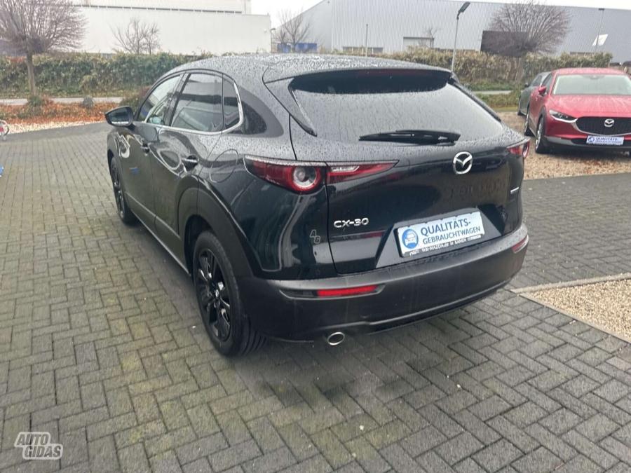 Black Mazda CX-30 2025 in Kaunas, with an engine capacity of 2.50 L and mileage of 15 thousand km for 29019 €, photo 5 on AUTOMOTO.COM.LV