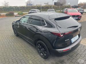 Black Mazda CX-30 2025 in Kaunas, with an engine capacity of 2.50 L and mileage of 15 thousand km for 29019 €, photo 7 on AUTOMOTO.COM.LV