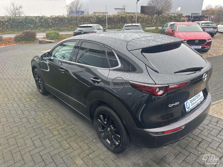 Black Mazda CX-30 2025 in Kaunas, with an engine capacity of 2.50 L and mileage of 15 thousand km for 29019 €, photo 7 on AUTOMOTO.COM.LV