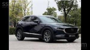 Black Mazda CX-30 2020 in Riga, with an engine capacity of 1.80 L and mileage of 71 thousand km for 19500 €, photo  on AUTOMOTO.COM.LV