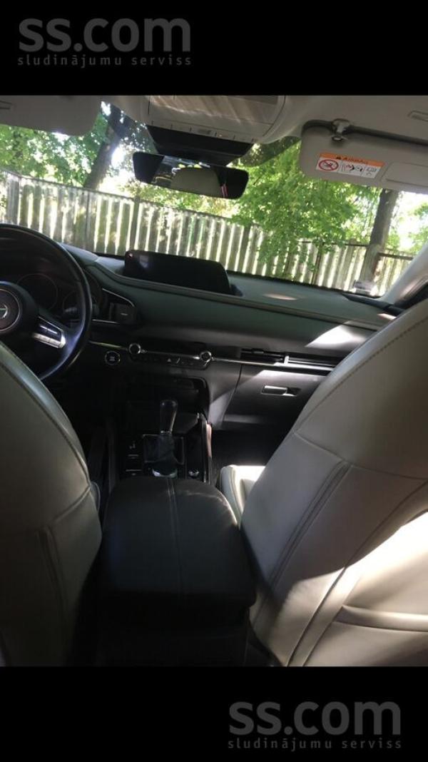 Black Mazda CX-30 2020 in Riga, with an engine capacity of 1.80 L and mileage of 71 thousand km for 19500 €, photo 4 on AUTOMOTO.COM.LV