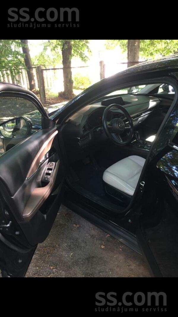 Black Mazda CX-30 2020 in Riga, with an engine capacity of 1.80 L and mileage of 71 thousand km for 19500 €, photo 5 on AUTOMOTO.COM.LV