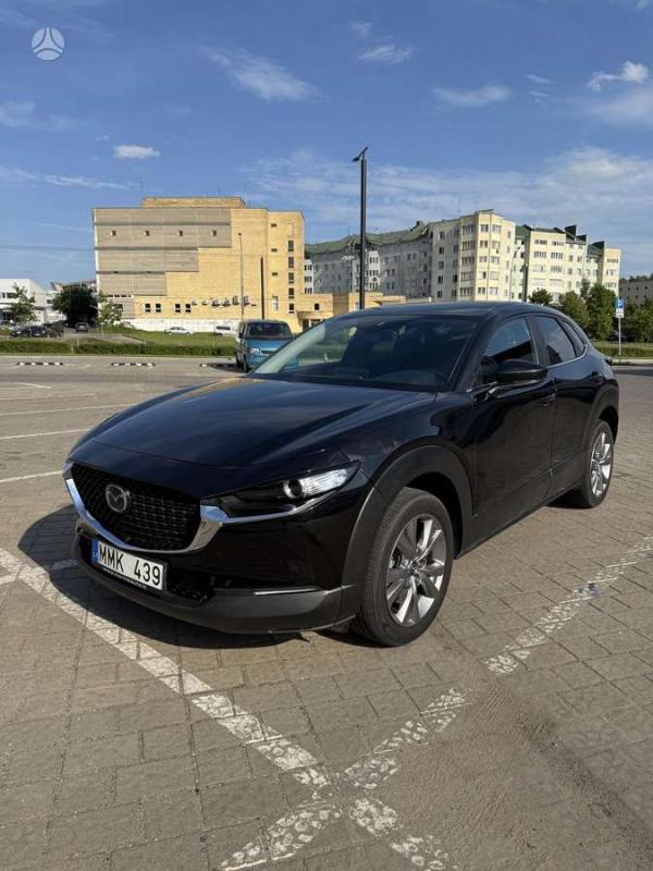 Black Mazda CX-30 2021 in Vilnius, with an engine capacity of 2.49 L and mileage of 79 thousand km for 16999 €, photo 1 on AUTOMOTO.COM.LV