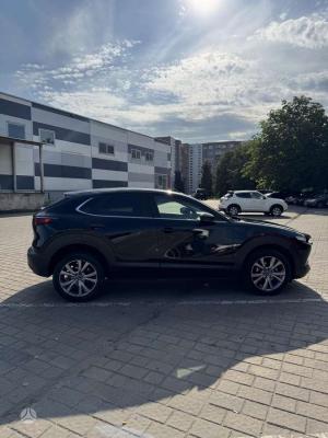 Black Mazda CX-30 2021 in Vilnius, with an engine capacity of 2.49 L and mileage of 79 thousand km for 16999 €, photo 7 on AUTOMOTO.COM.LV