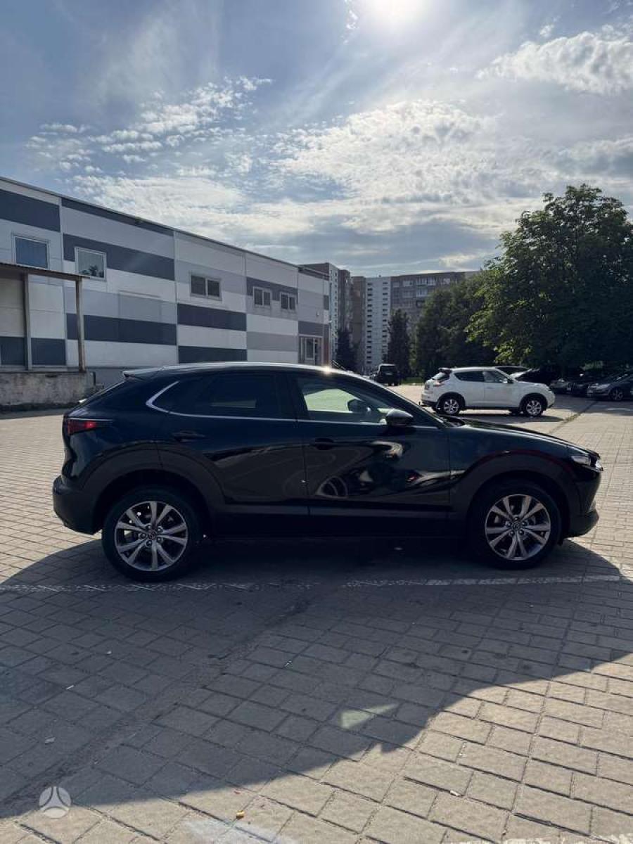 Black Mazda CX-30 2021 in Vilnius, with an engine capacity of 2.49 L and mileage of 79 thousand km for 16999 €, photo 7 on AUTOMOTO.COM.LV