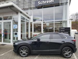 Black Mazda CX-30 2021 in Kaunas, with an engine capacity of 2.00 L and mileage of 46 thousand km for 25522 €, photo  on AUTOMOTO.COM.LV