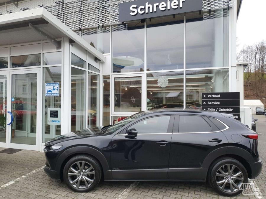 Black Mazda CX-30 2021 in Kaunas, with an engine capacity of 2.00 L and mileage of 46 thousand km for 25522 €, photo 1 on AUTOMOTO.COM.LV
