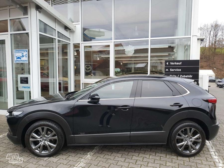 Black Mazda CX-30 2021 in Kaunas, with an engine capacity of 2.00 L and mileage of 46 thousand km for 25522 €, photo 5 on AUTOMOTO.COM.LV