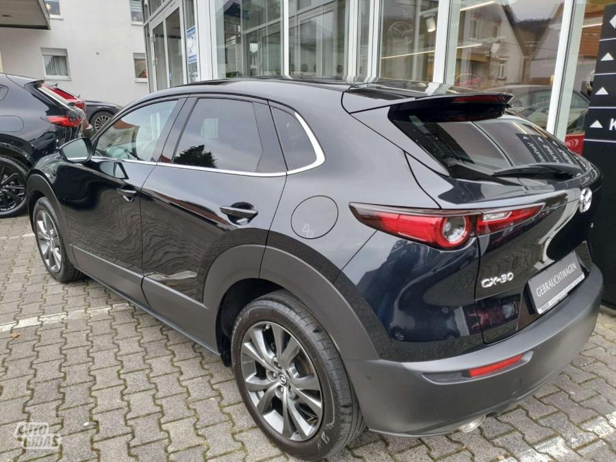 Black Mazda CX-30 2021 in Kaunas, with an engine capacity of 2.00 L and mileage of 46 thousand km for 25522 €, photo 6 on AUTOMOTO.COM.LV