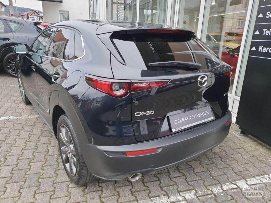 Black Mazda CX-30 2021 in Kaunas, with an engine capacity of 2.00 L and mileage of 46 thousand km for 25522 €, photo 7 on AUTOMOTO.COM.LV