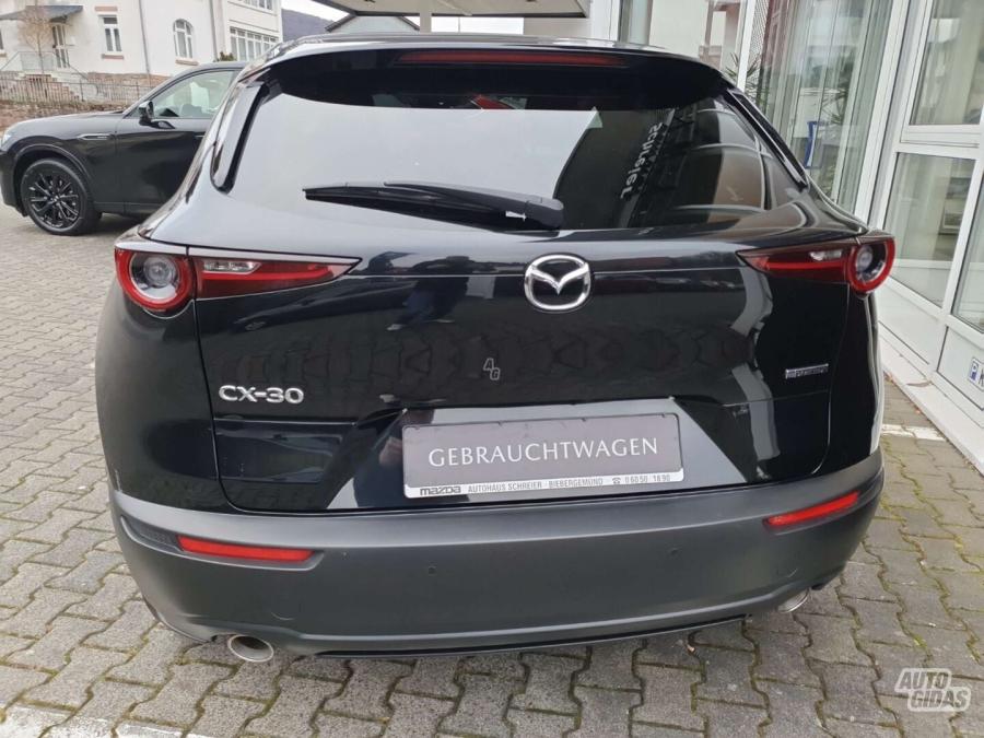 Black Mazda CX-30 2021 in Kaunas, with an engine capacity of 2.00 L and mileage of 46 thousand km for 25522 €, photo 8 on AUTOMOTO.COM.LV