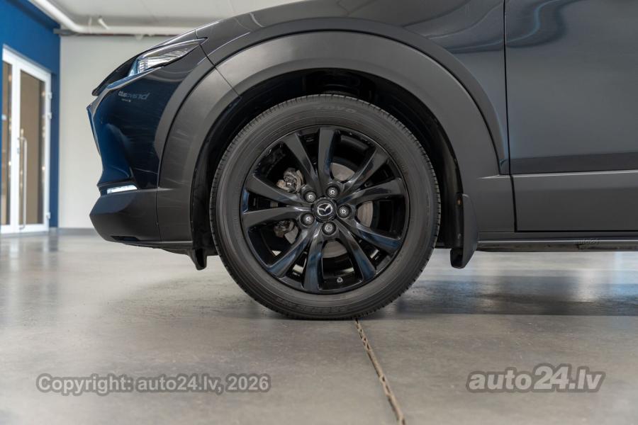 Melns Mazda CX-30 2022 Tallina, ar dzinēja tilpumu 2.00 L un nobraukumu 50 tūkst. km par 23900 €, foto 18 vietnē AUTOMOTO.COM.LV
