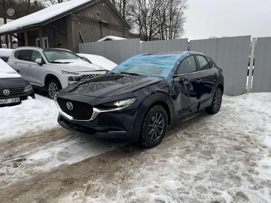 Blue Mazda CX-30 2023 in Kaunas, with an engine capacity of 2.00 L and mileage of 12 thousand km for 8800 €, photo 1 on AUTOMOTO.COM.LV
