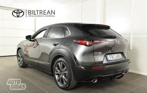 Grey Mazda CX-30 2020 in Kaunas, with an engine capacity of 0.00 L and mileage of 62 thousand km for 29312 €, photo 2 on AUTOMOTO.COM.LV