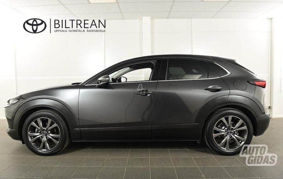Grey Mazda CX-30 2020 in Kaunas, with an engine capacity of 0.00 L and mileage of 62 thousand km for 29312 €, photo 3 on AUTOMOTO.COM.LV
