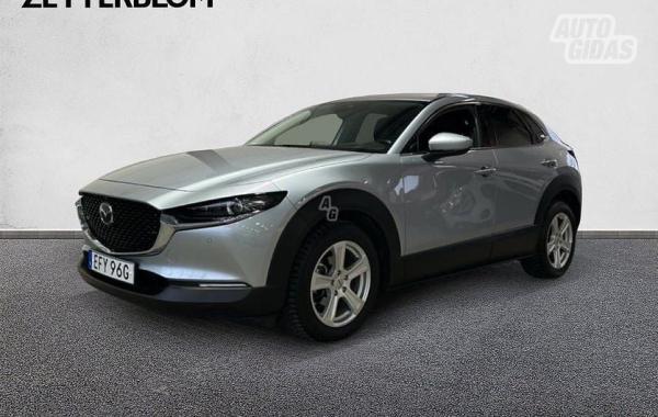 Grey Mazda CX-30 2020 in Kaunas, with an engine capacity of 0.00 L and mileage of 77 thousand km for 27373 €, photo 1 on AUTOMOTO.COM.LV
